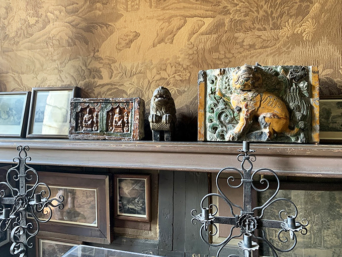 Artifacts line the mantel like contestants in a very niche beauty pageant. Each piece silently whispering, "Pick me as your favorite!"