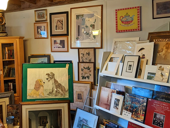 Framed artwork leans and hangs throughout, offering wall decor with more character than anything from a big box store.