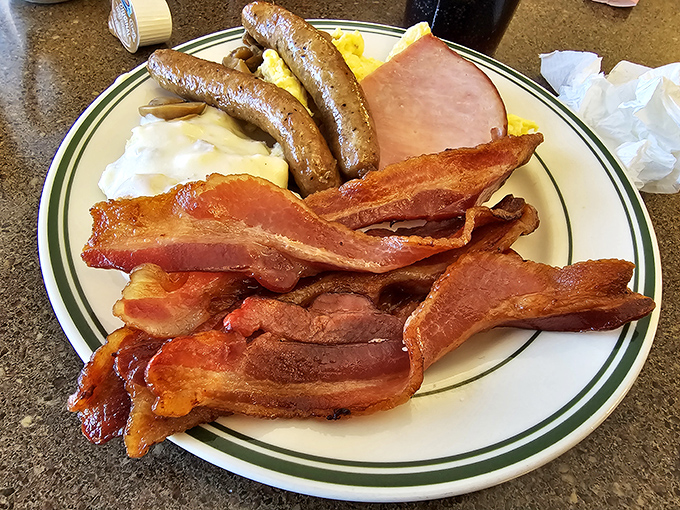 Bacon that doesn't just sizzle, it performs—crispy enough to snap, substantial enough to satisfy, and arranged like it's taking a well-deserved bow.