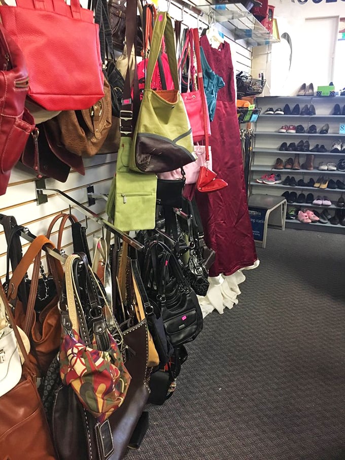 Handbag heaven for the accessory enthusiast! These colorful carryalls once held someone's daily essentials and are ready for their next adventure.