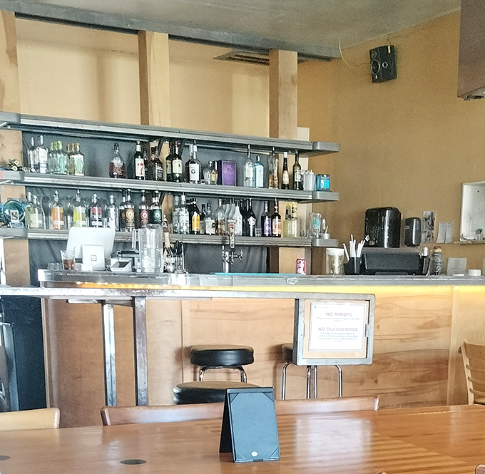 The bar area hints at Shakabrah's dual personality&mdash;morning breakfast haven transforms into evening hangout spot as the day progresses.