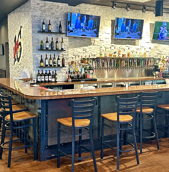 The bar area&mdash;where stone meets wood meets liquid happiness&mdash;is like the living room you wish you had, if your living room served perfect manhattans.