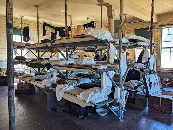 These stark barracks housed dreams and fears of thousands of immigrants—a humbling reminder that your "long wait" at airport customs is nothing in comparison.