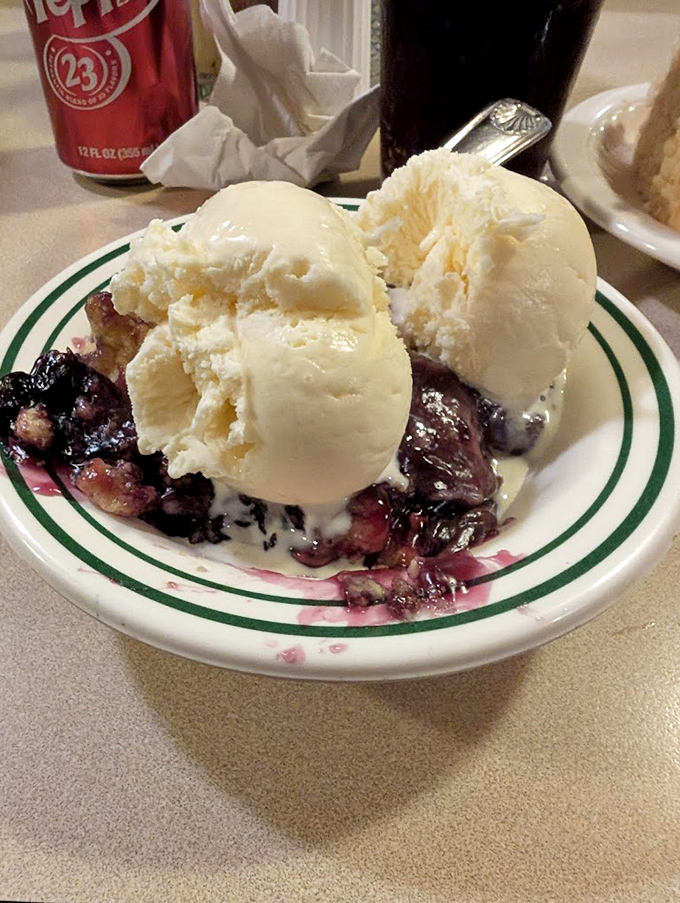 Warm berry cobbler meets cold ice cream in a dessert romance that's been melting hearts longer than "The Notebook." Life is indeed short&mdash;eat dessert first.