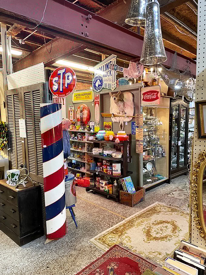 Vintage advertising heaven! That barber pole has seen more style changes than Madonna, and those Coca-Cola signs remind us when soda was an event.
