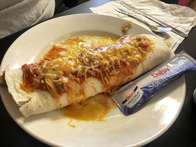 This breakfast burrito isn't messing around. Cheese melting over the edges, sauce with attitude&mdash;it's the morning meal that thinks it's dinner, and I'm here for it.
