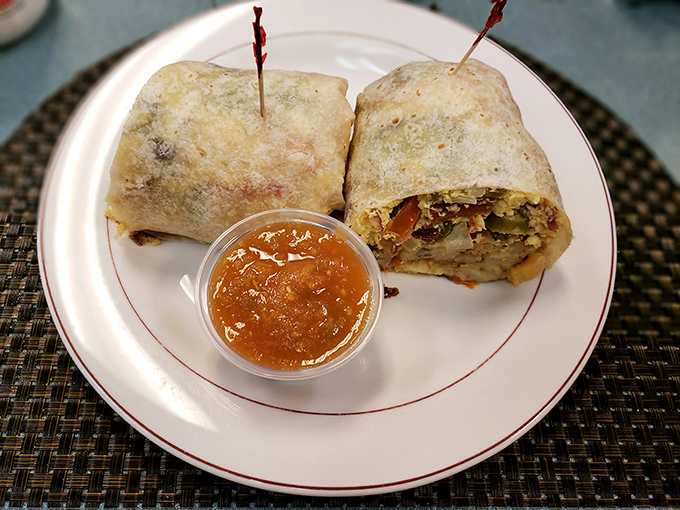 This breakfast burrito doesn't need a passport to take your taste buds on a journey. The side of salsa adds just the right kick.