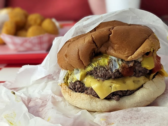 This isn't just a cheeseburger&mdash;it's a masterclass in American comfort food. Two patties, melted cheese, and a soft bun that yields with each bite.