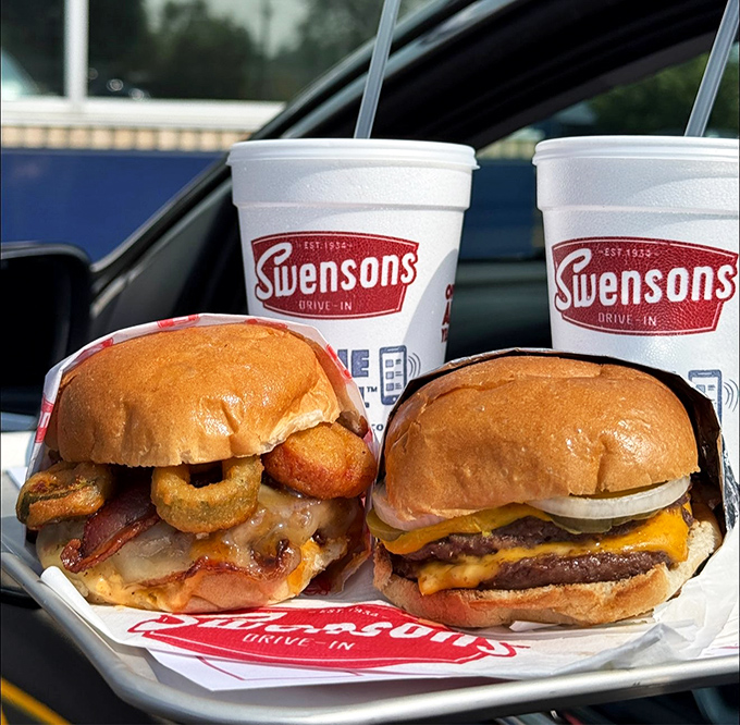 Two burgers, two drinks, one perfect moment&mdash;this is what they mean by "relationship goals" in the drive-in universe.
