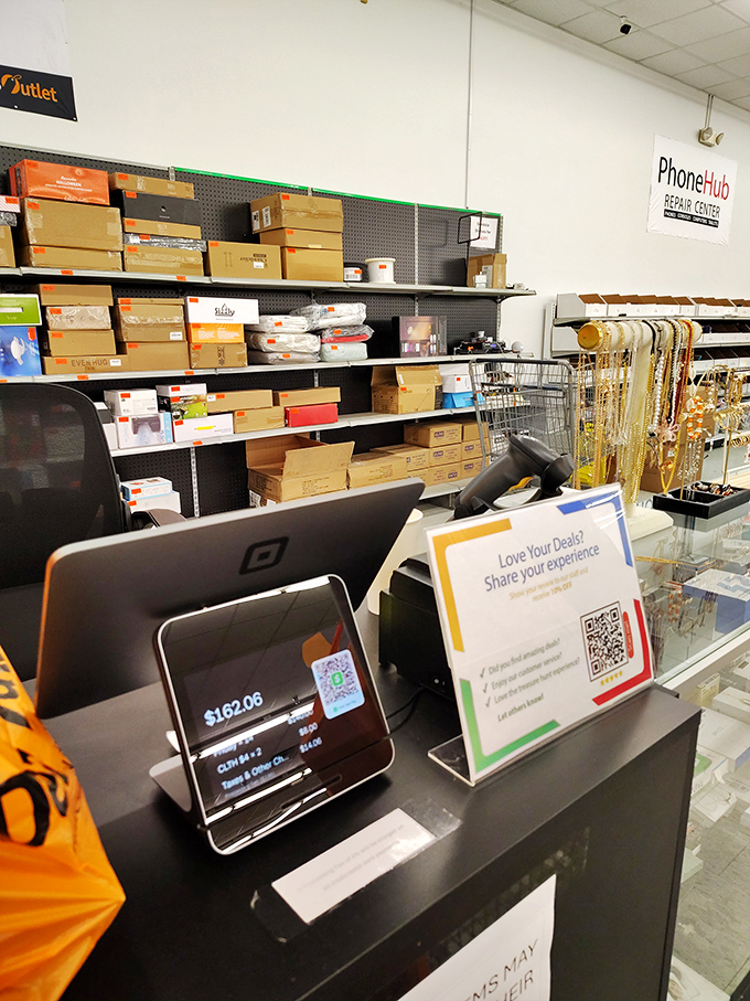 The digital display tells the tale: $162.06 worth of treasures that would've cost triple elsewhere. Victory never looked so orange.