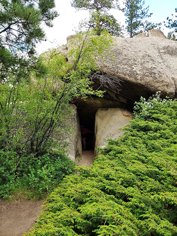 Nature carved this granite cave entrance like it was auditioning for a Indiana Jones movie set.