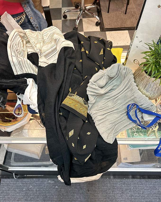 The joy of discovery happens in these narrow aisles, where each hanger might hold your next favorite piece.