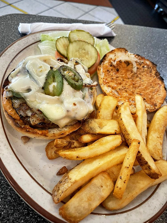 Jalape&ntilde;os and melted cheese transform this burger into a spicy masterpiece that makes your taste buds feel like they've won the flavor lottery.