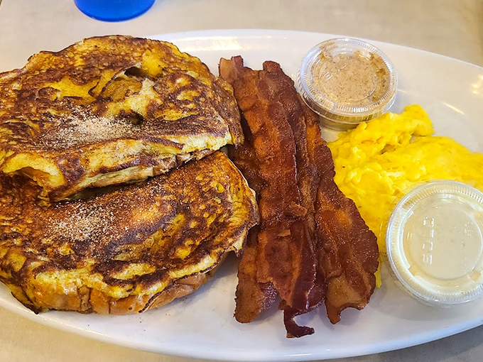 French toast that's had a cinnamon-sugar spa treatment, served with bacon that's achieved that perfect crispy-yet-chewy texture science still can't explain.
