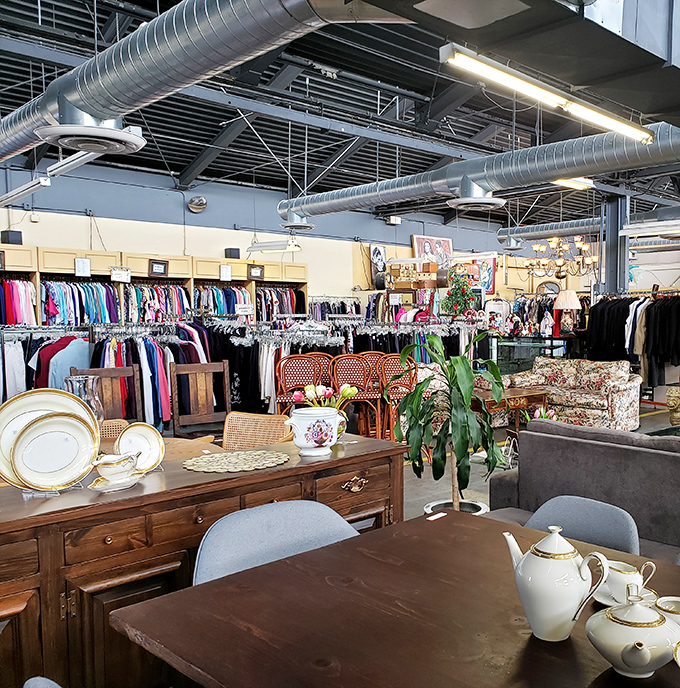The clothing section mingles with furniture in a dance of decades&mdash;that teapot might have served tea to someone wearing that very dress.