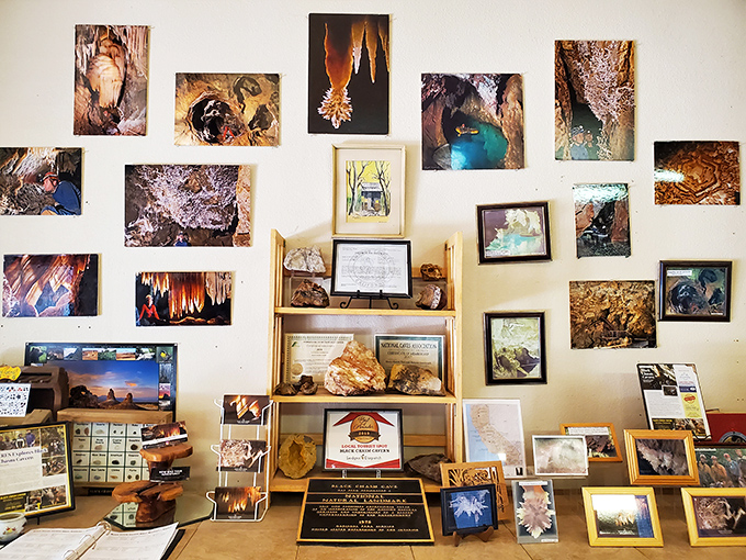 A wall of wonder&mdash;photographs and artifacts tell the story of Black Chasm's discovery and ongoing exploration, each image a window to underground marvels.
