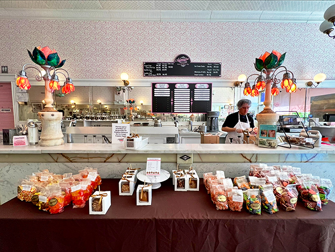 Tiffany-style lamps illuminate treasures sweeter than jewelry. The counter display showcases confections that make diamonds seem like mere rocks.