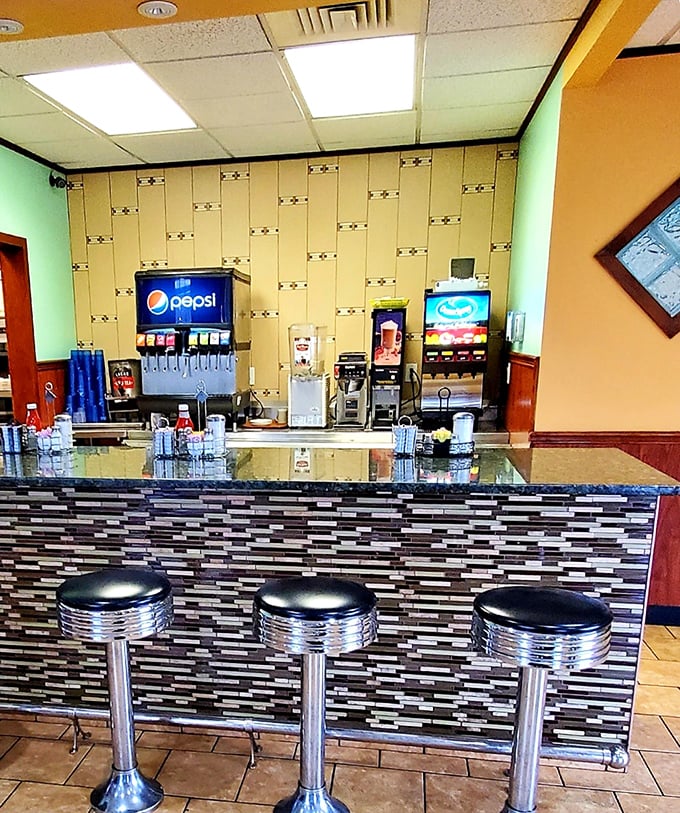 Chrome stools and a tiled counter that could tell a thousand stories&mdash;the beating heart of any proper diner where regulars become family.