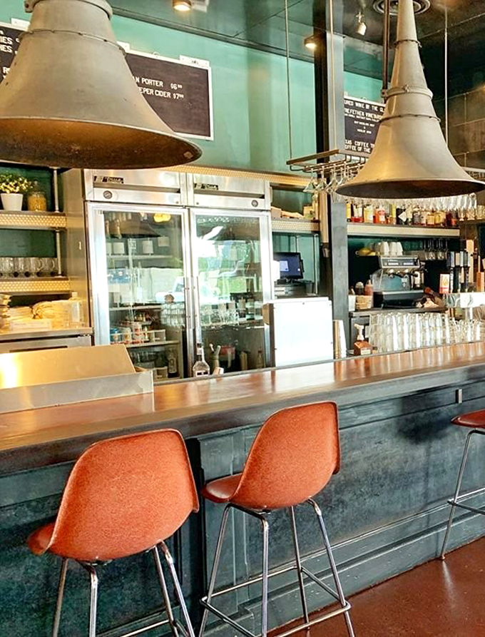 The counter seating offers front-row seats to the culinary theater happening in that open kitchen.