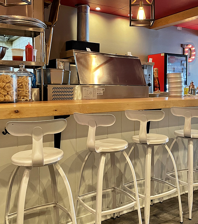 Counter seating that lets you watch the magic happen. It's dinner and a show, minus the overpriced tickets.