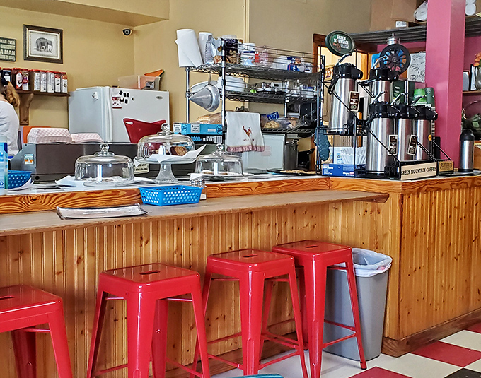 Red stools at a wooden counter&mdash;the universal invitation to belly up, order something delicious, and maybe leave with a new friend or two.