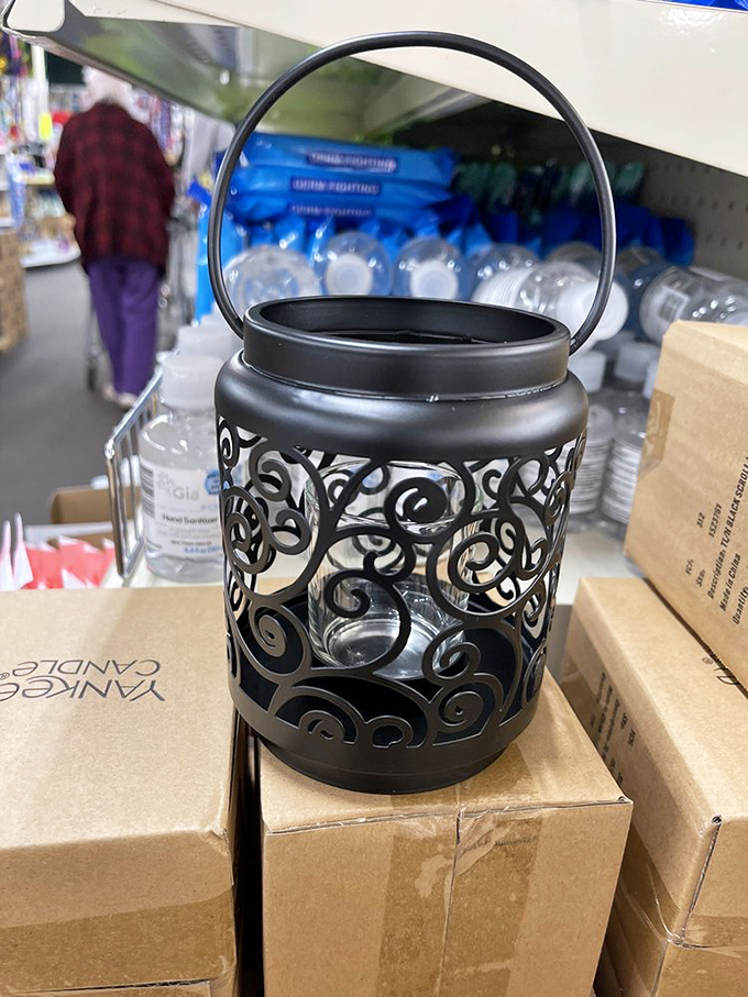 This intricate metal lantern transforms any space into a cozy retreat. Proof that ambiance doesn't require a second mortgage.
