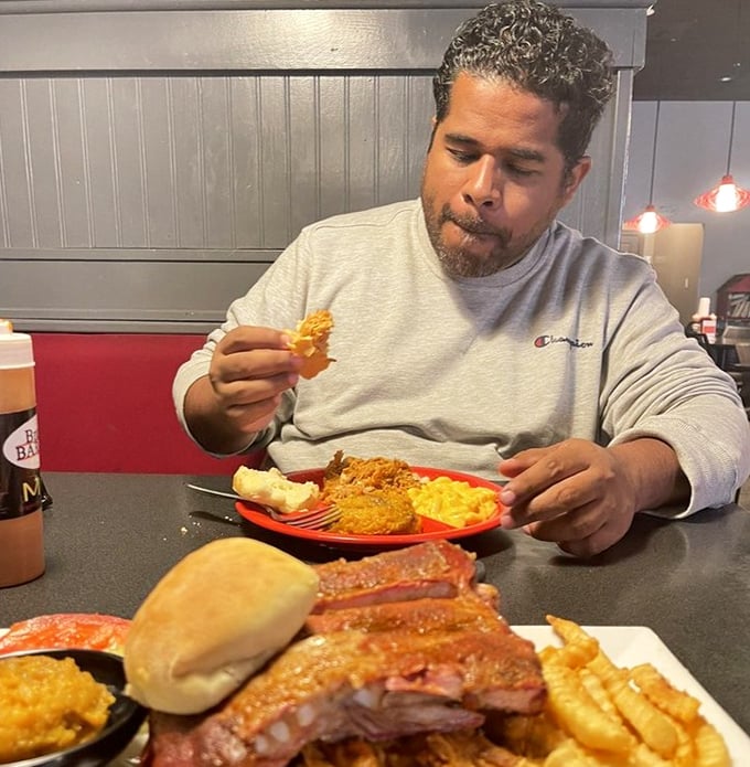 Bold red walls and comfortable seating create the kind of space where good meals turn into great memories.