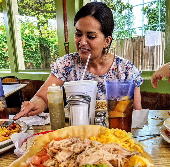 Where construction workers and food critics share tables, united by their appreciation for authentic flavors.