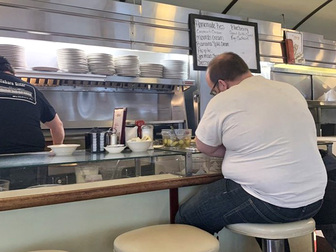 The counter seating offers front-row tickets to the greatest show on earth: short-order cooks performing their breakfast ballet with spatulas as batons.