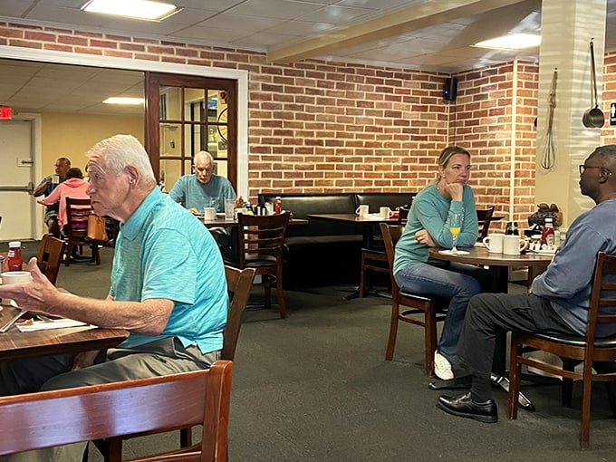 The dining room hums with the energy of regulars and newcomers alike, all united by the universal language of good food.