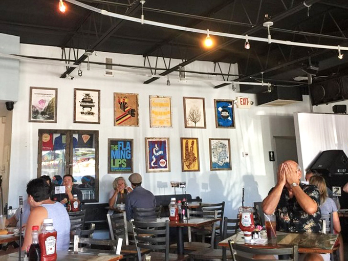 The walls adorned with concert posters tell stories of musical nights past, while diners create new memories over plates of comfort food.