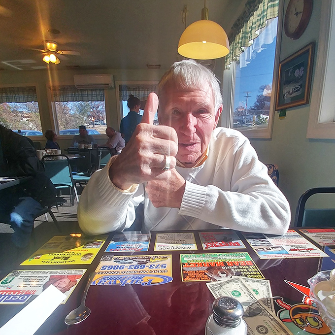 The universal thumbs-up&mdash;international symbol for "I've found food paradise." This gentleman knows what Missouri dining is all about.