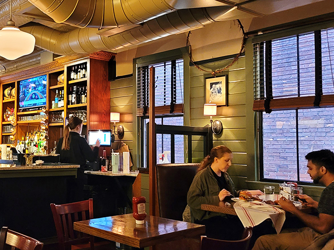 Comfortable booths and happy diners create the kind of welcoming atmosphere that keeps people coming back for years and decades.