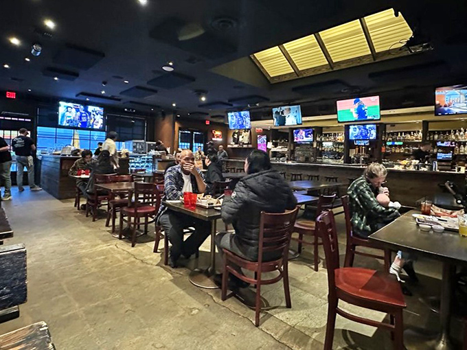 The modern barbecue joint experience: good food, good company, and enough TVs to ensure you never miss a game.