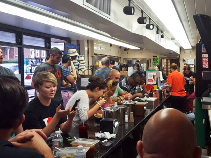 The counter seating puts you front-row at the sandwich theater. Where else can you watch your lunch being crafted with such practiced precision?