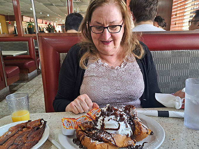 Where dessert dreams come true! That chocolate-drizzled French toast isn't just breakfast – it's what pancakes aspire to be in their next life.