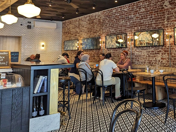 The exposed brick walls have heard a thousand conversations and kept every secret. These tables have witnessed first dates, business deals, and countless "mmms."