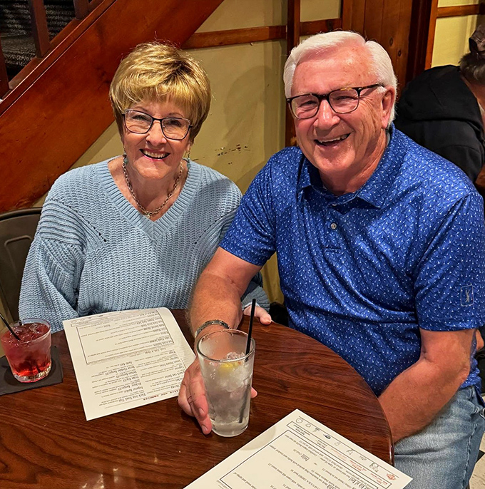 Happy diners sharing stories and laughter&mdash;the true measure of any restaurant's success isn't just on the plate, but in the memories being made.