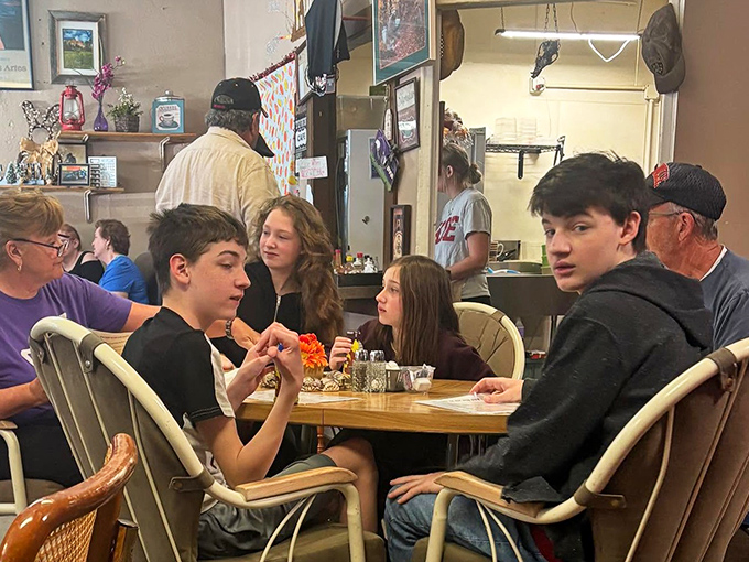 Where generations gather around tables that have heard it all. The real social network happens here, no passwords or profiles required&mdash;just good food and better conversation.