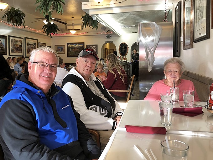 The dining room buzzes with conversation and laughter &ndash; the universal soundtrack of a beloved local institution.