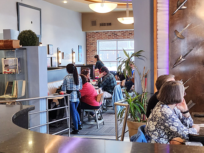 The bustling interior where locals and visitors alike gather. Notice how nobody's looking at their phones? That's the power of anticipating great food.