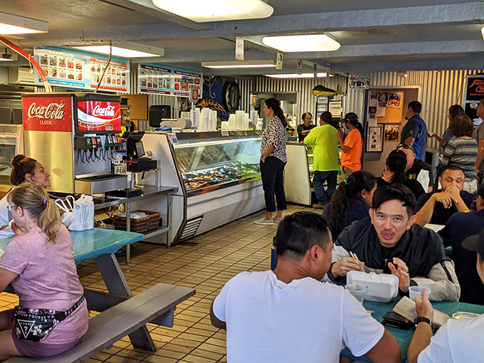 The true measure of a local spot: diverse diners united by the universal language of "this food is so good I can't talk right now."