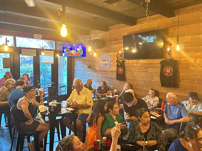 The wooden-walled dining room feels like a neighborhood gathering spot where strangers become friends over beef sandwiches.