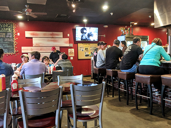 A packed house of barbecue pilgrims worshipping at the altar of smoke. Notice the absence of conversation&mdash;everyone's too busy eating.