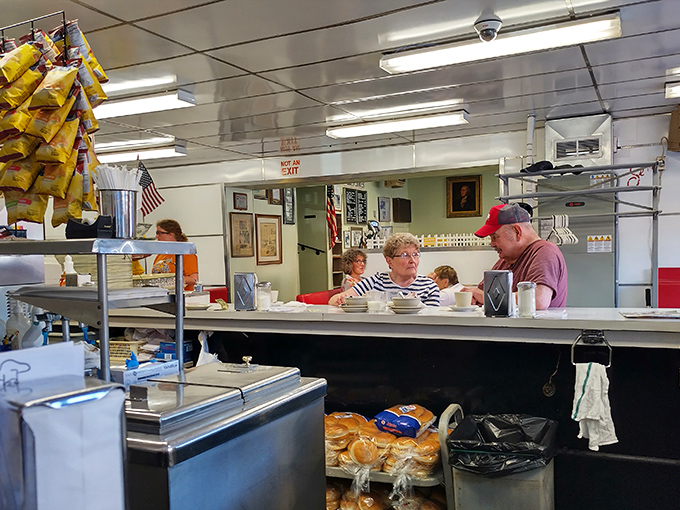 Counter seating offers front-row seats to the griddle show, where burgers sizzle and hungry patrons become very happy people.