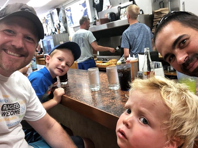 Three generations sharing counter space and burger bliss. This is how food traditions survive&mdash;one family meal at a time.