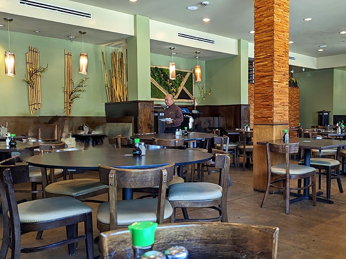 Spacious dining area with bamboo accents where real people gather for meals that justify the drive from anywhere in Houston.