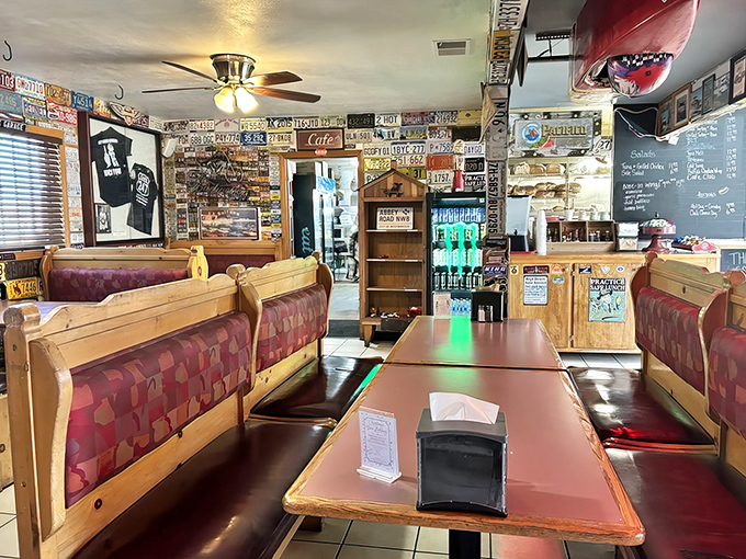 Wooden booths that have witnessed countless road trip stories, family celebrations, and first dates. The kind of authentic diner seating that welcomes weary travelers.
