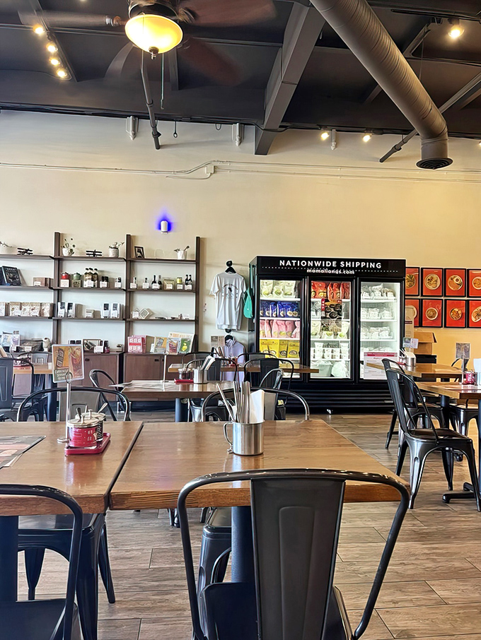 Simple wooden tables and metal chairs create the perfect backdrop for the real stars: the dishes that will soon occupy every inch of space.