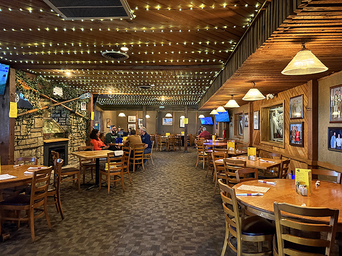 String lights, wooden beams, and the promise of good times. The dining room has that "everyone's welcome" vibe that defines great American eateries.